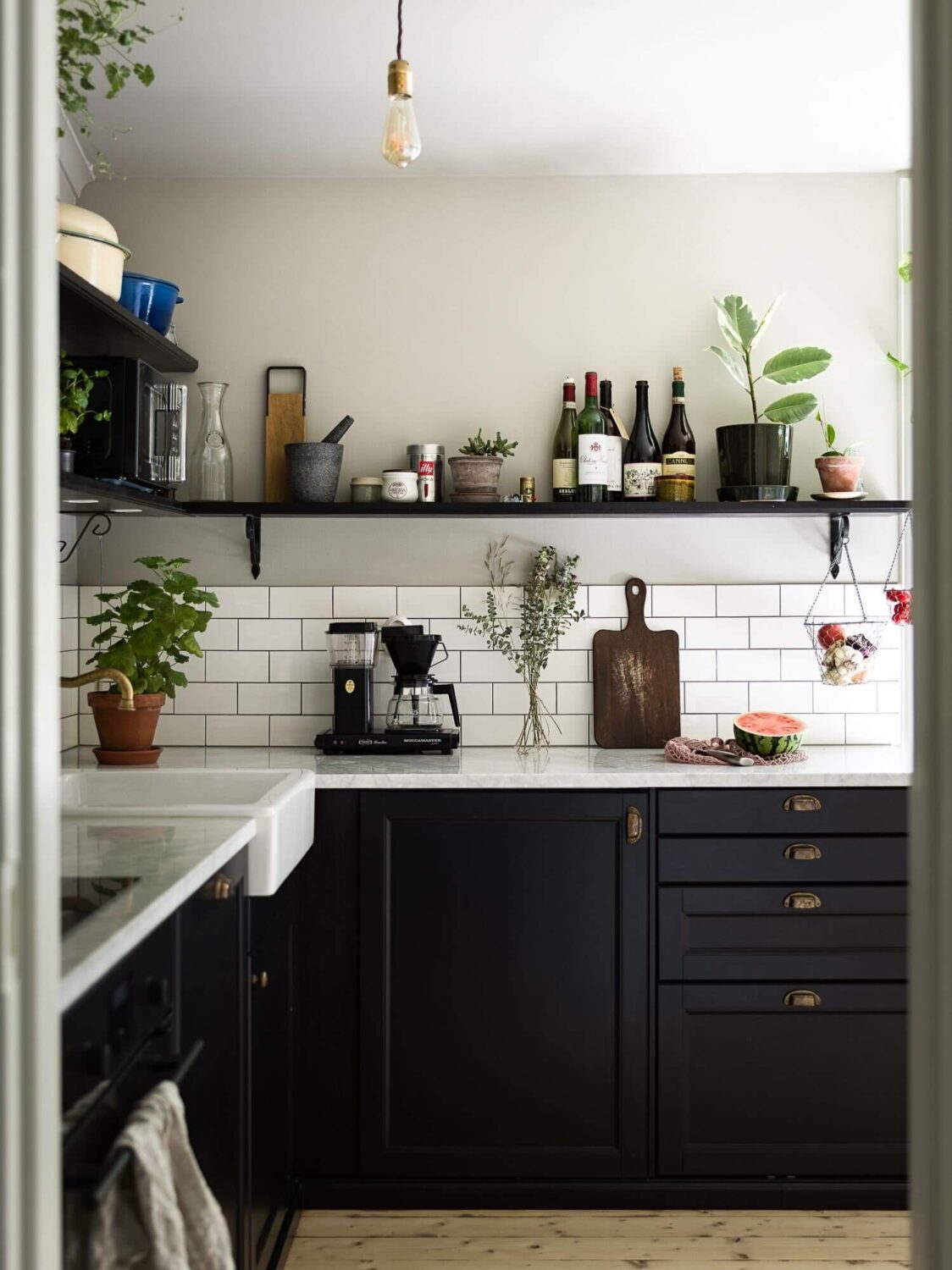 A Vintage Apartment with a Black Kitchen in Sweden - The Nordroom