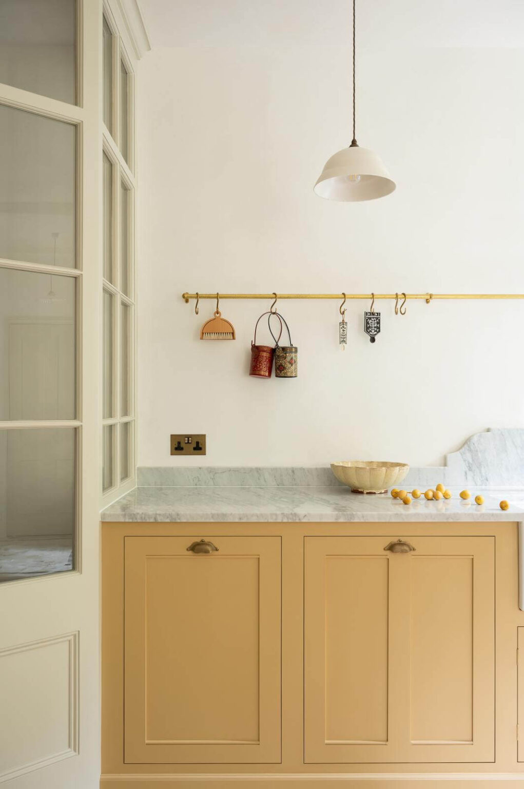 A deVOL Kitchen with Butter Yellow Cabinets - The Nordroom