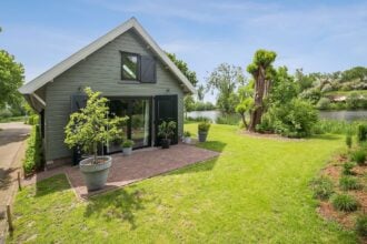 A Dutch Barn House with Brick Floors and Wooden Ceilings - The Nordroom