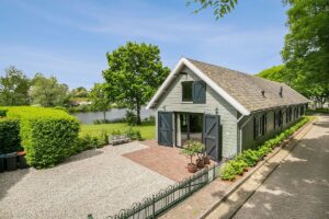A Dutch Barn House with Brick Floors and Wooden Ceilings - The Nordroom