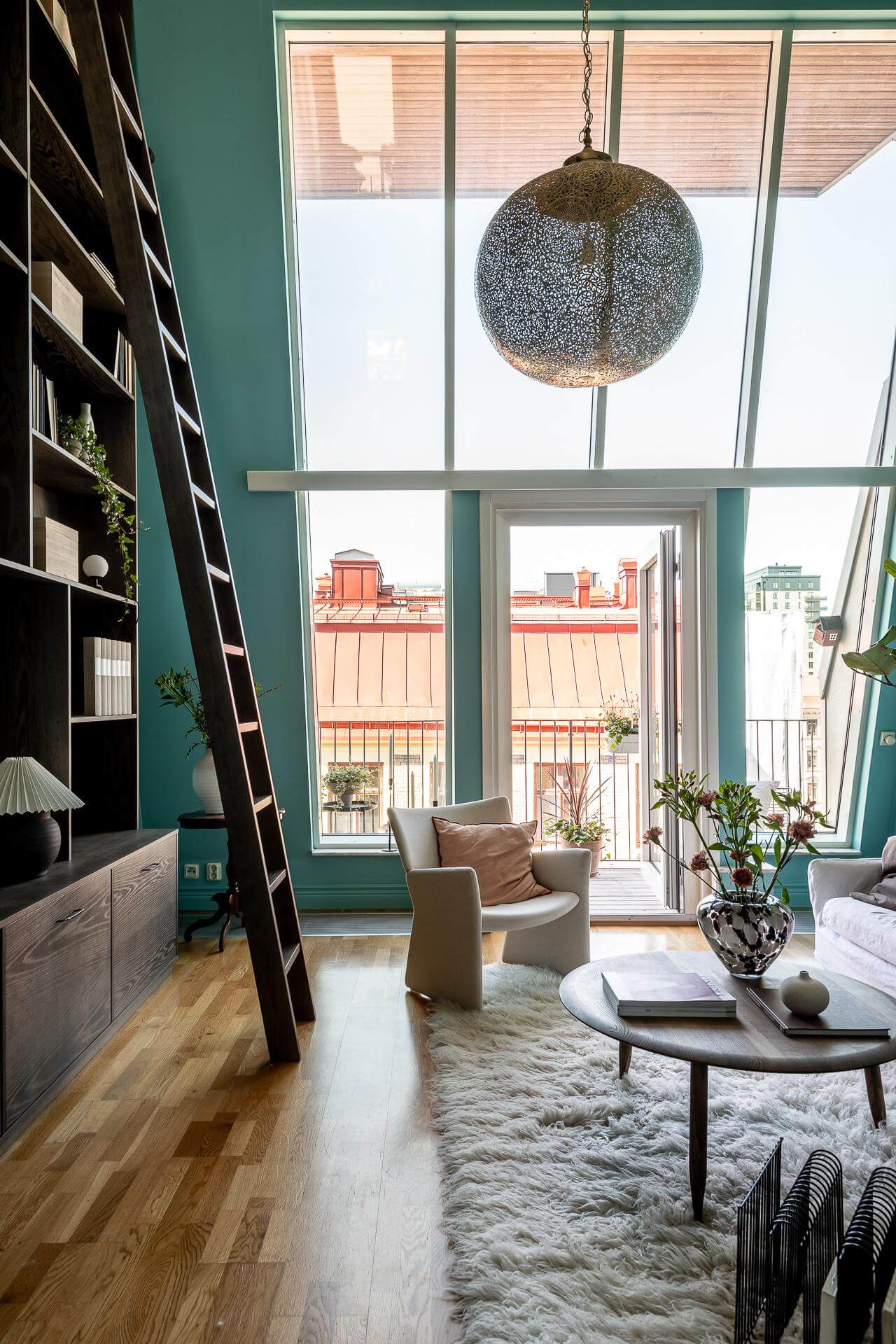 Floor-to-Ceiling Bookcases and Windows in a Loft Style Apartment - The ...