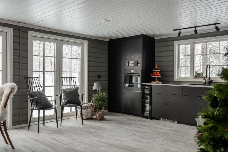 A Gray Swedish Log House Decorated for Christmas - The Nordroom