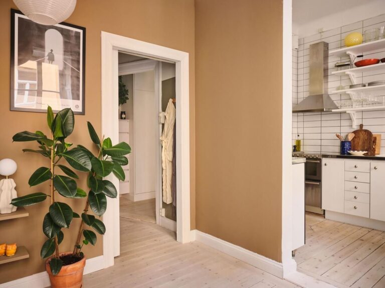 A Small Apartment with Calm Brown, Green, and Yellow Walls - The Nordroom