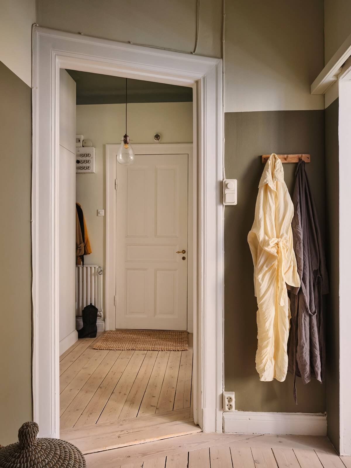A Small Apartment with Calm Brown, Green, and Yellow Walls - The Nordroom