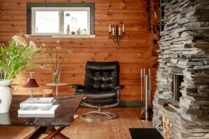 A Warm Scandinavian Log House with a Green Roof - The Nordroom