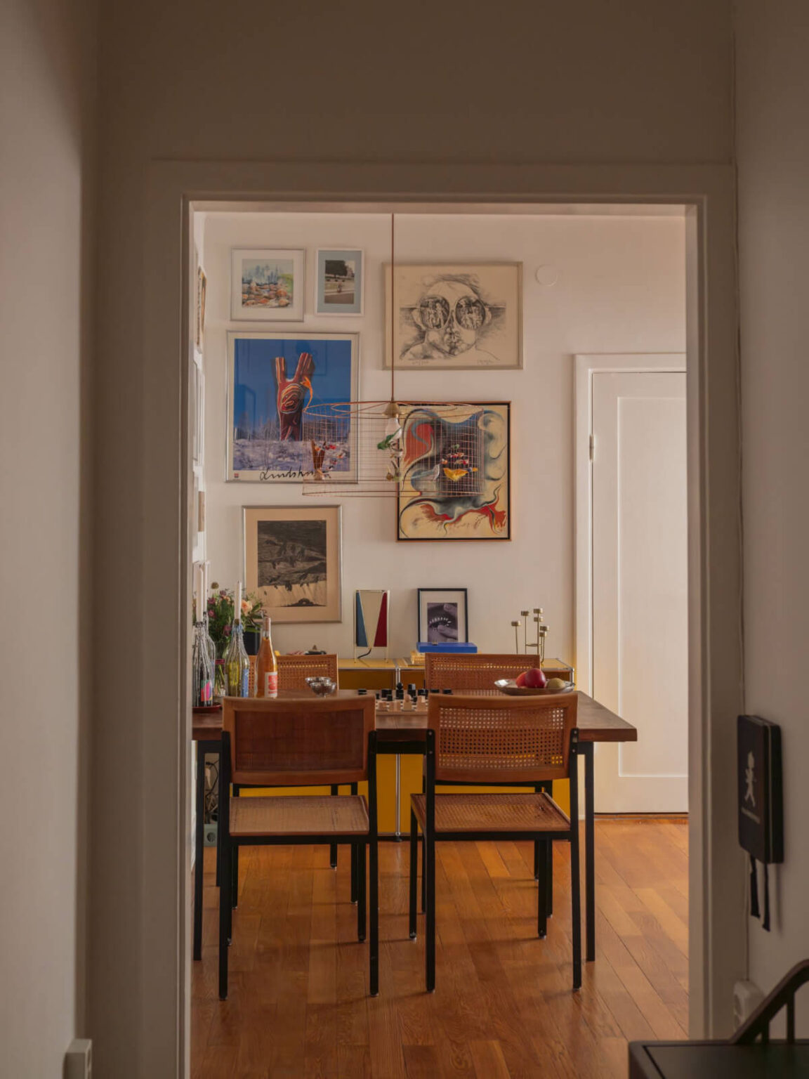 An Airy One-Bedroom Apartment with Art and A Yellow Kitchen - The Nordroom