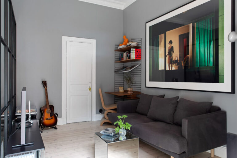 A Gray Studio Apartment with an Industrial Room Divider - The Nordroom