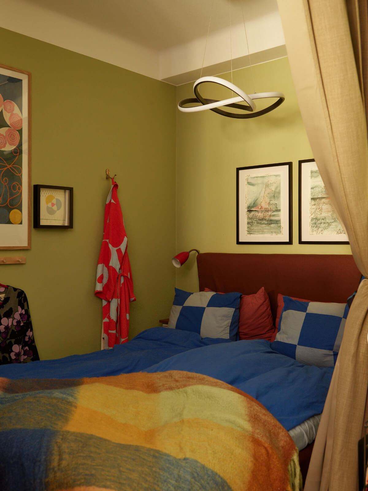 A Colorful Studio Apartment with Smart Storage and A Cozy Bed Niche ...