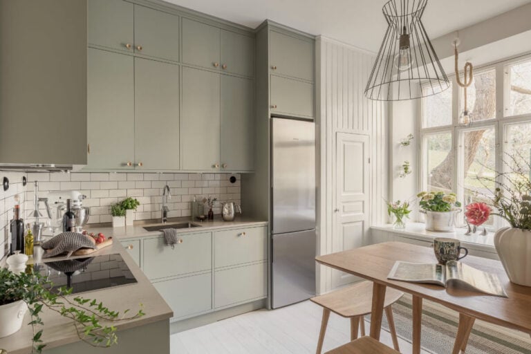 A Bright Swedish Apartment with Period Features and a Green Kitchen ...