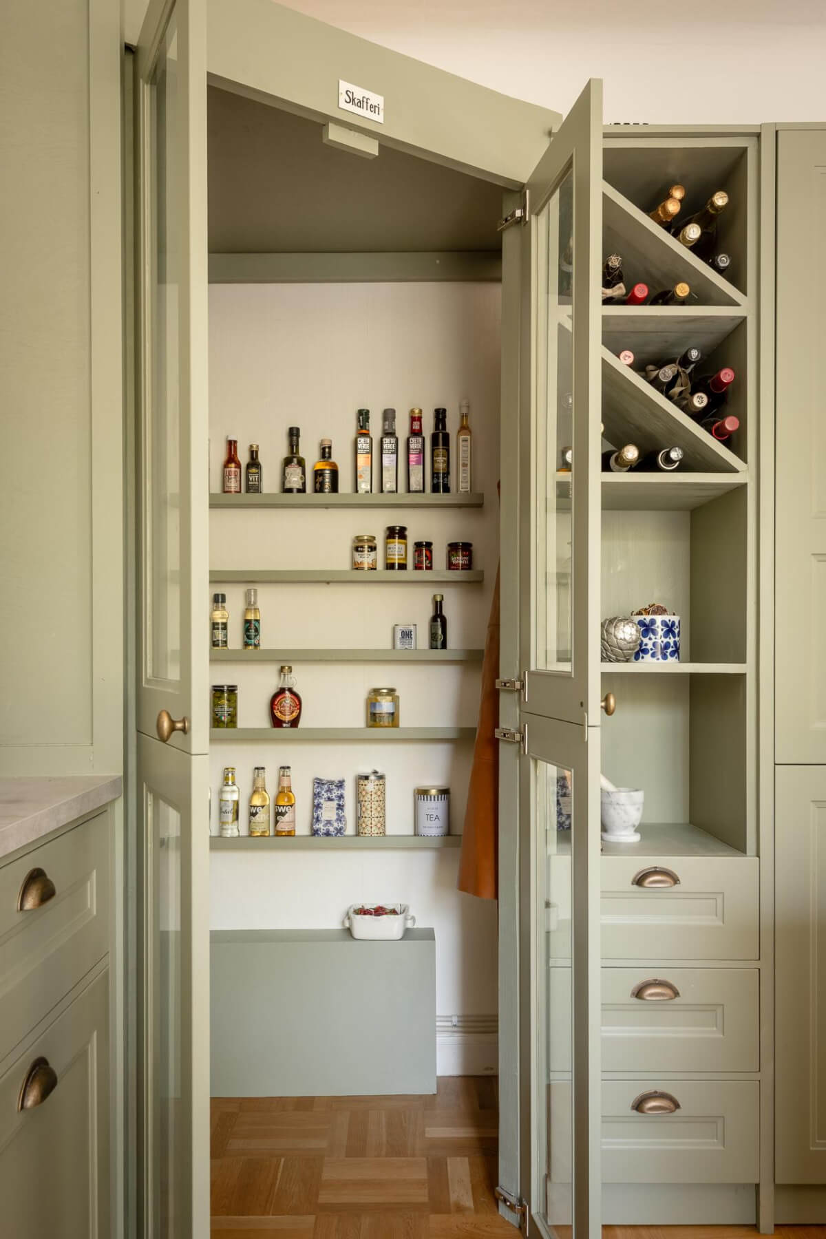 A Cozy Swedish Apartment with a Walk-In Pantry in the Sage Green ...