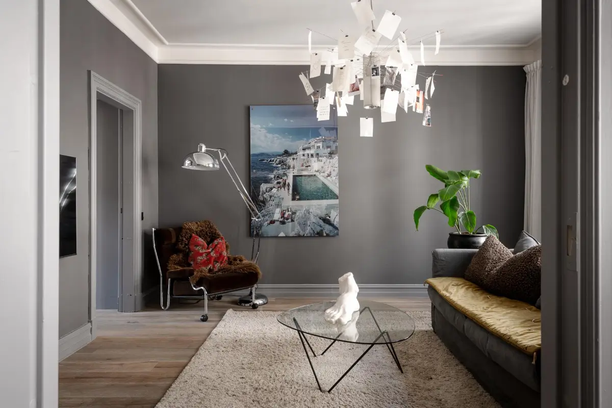 A Dark Gray Swedish Apartment with an Olive Green Kitchen - The Nordroom