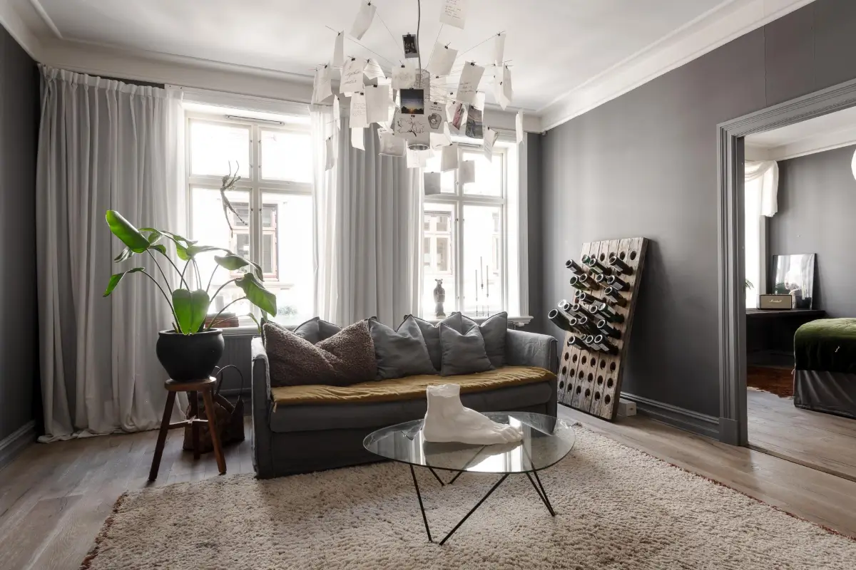 A Dark Gray Swedish Apartment with an Olive Green Kitchen - The Nordroom