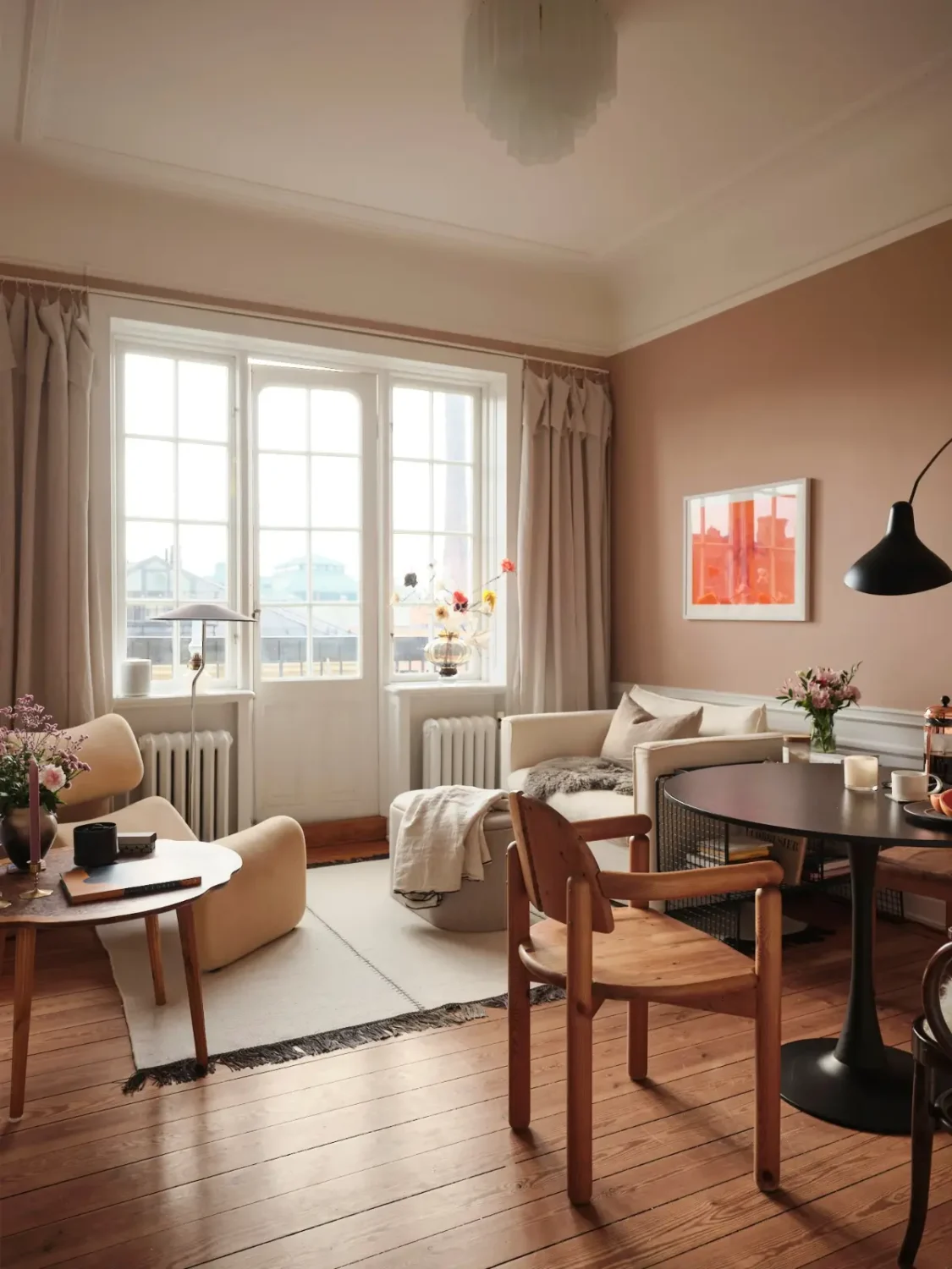 Warm Pink Walls and a Glass Room Divider in a Small Stockholm Apartment ...